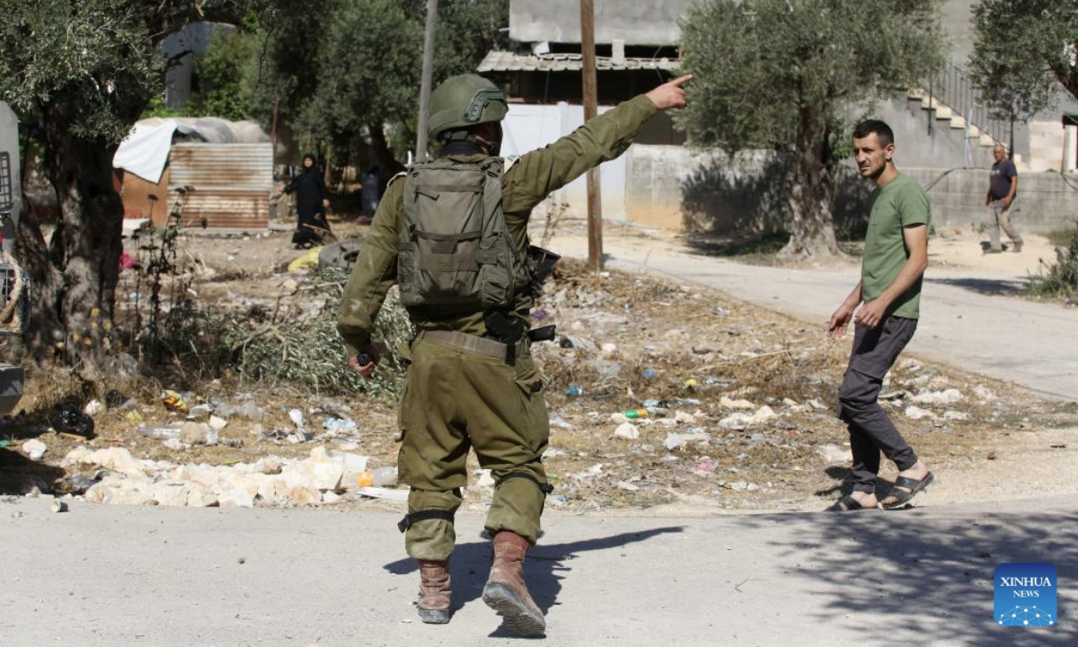 Members of Israeli forces carry out operation in Qabatiya town, West ...
