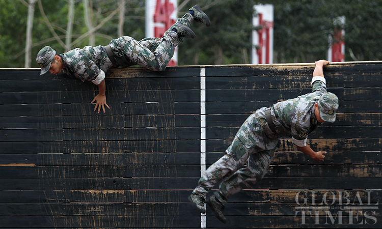 Climb, crawl and lunge: Cadets drill at the Academy of Armored Forces ...