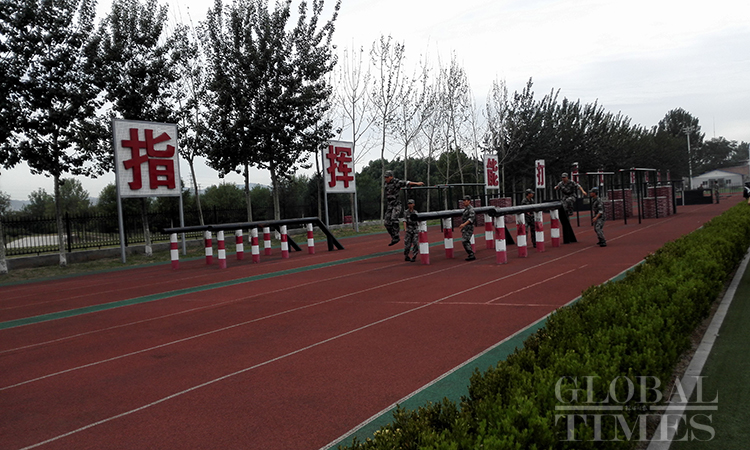 Climb, crawl and lunge: Cadets drill at the Academy of Armored Forces ...