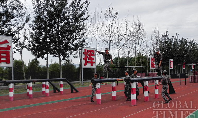 Climb, crawl and lunge: Cadets drill at the Academy of Armored Forces ...